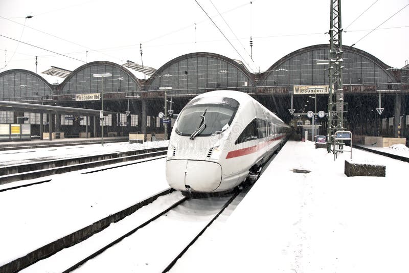 High Speed Train in Station in Wintertime Stock Image - Image of rush ...
