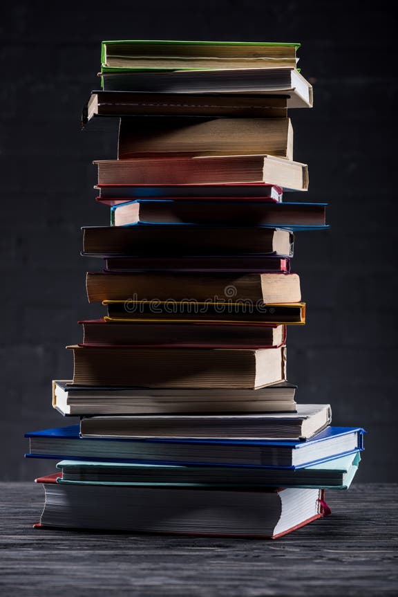 High Stack of Books on Dark Stock Image - Image of study, smart: 120918621