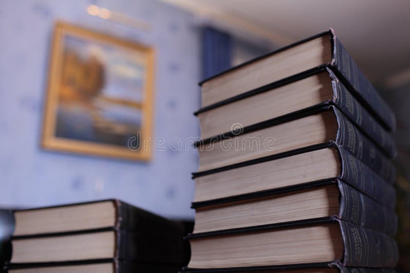 High Stack of Books on the Desk in Library Stock Photo - Image of ...