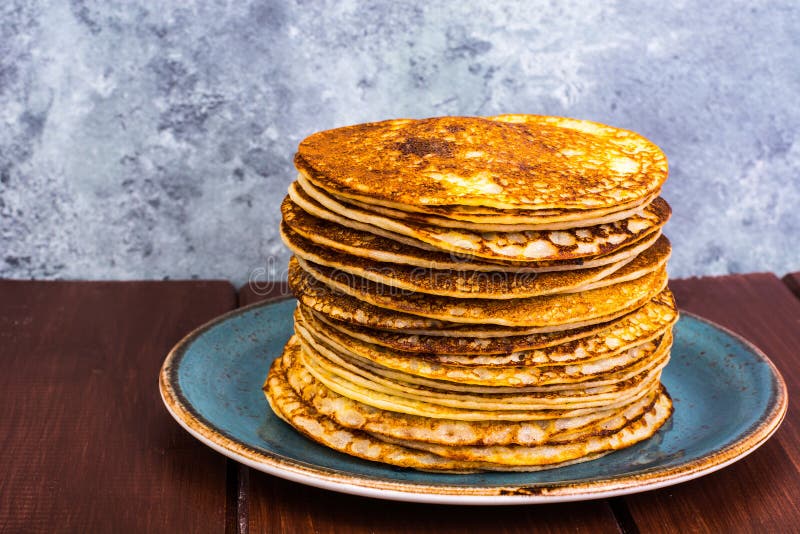 High Stack of Hot Pancakes on Wooden Table Stock Photo - Image of ...