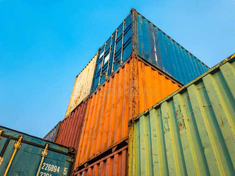 High Stack Towering Containers Box Up To the Blue Sky in Logistic ...