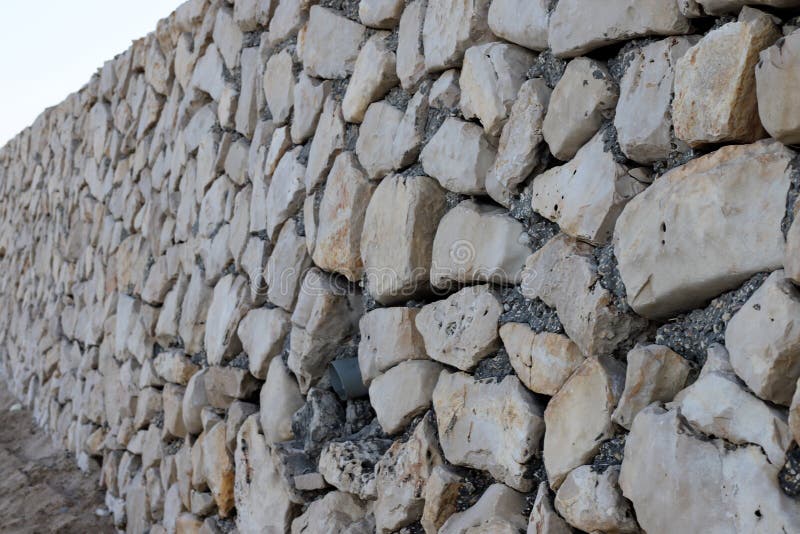 High Stone and Concrete Wall Stock Photo - Image of concrete, morning ...