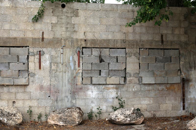 High Stone and Concrete Wall Stock Photo - Image of stones, built ...