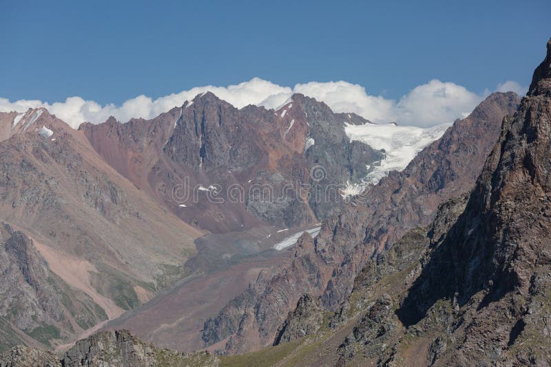 High Stone Mountains on Top of the Clouds Stock Photo - Image of blue ...