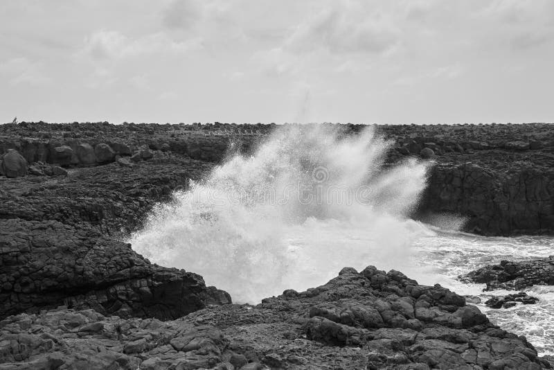 A High Surge of Waves on the Rocky Coast of the Atlantic in Black and ...