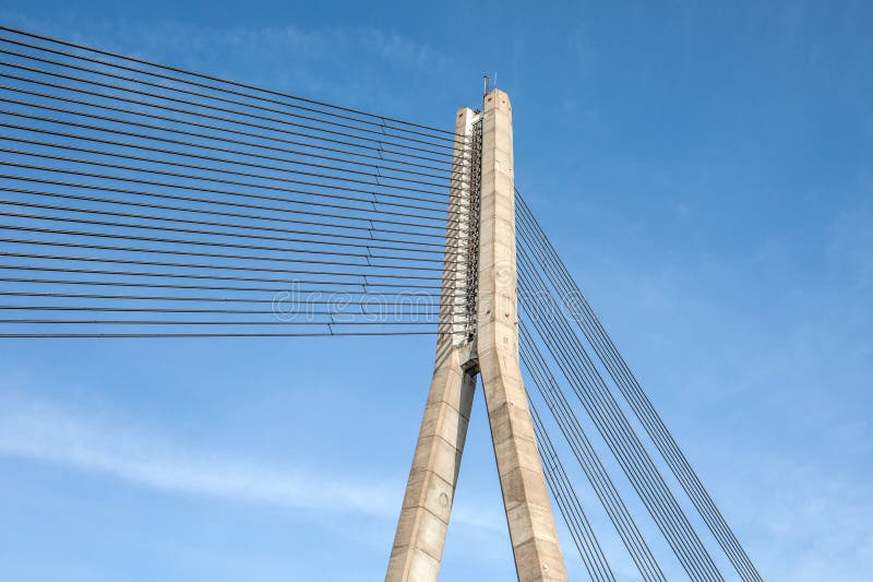 High Suspension Bridge Tower with Cables Against Clear Blue Sky Stock ...