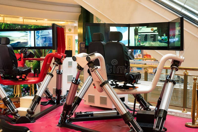 High Tech Computer Simulation Game with Hydraulics. Editorial Stock ...