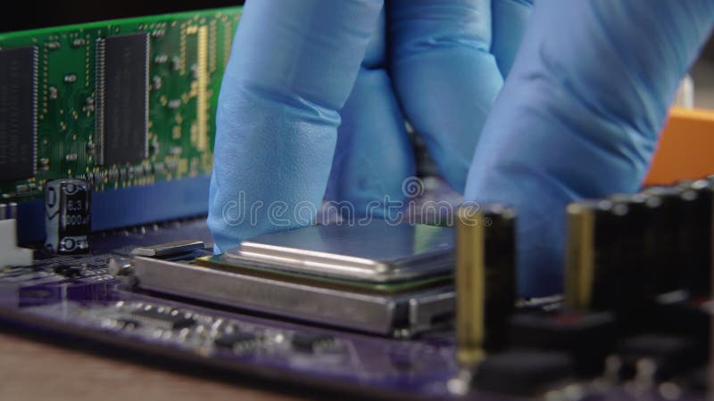 The Process of Installing a Processor on a Computer Motherboard Stock ...