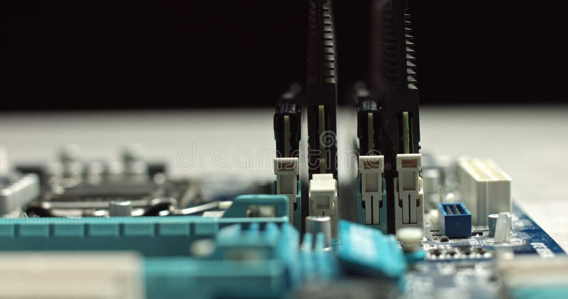 High Tech. the Process of Installing RAM on a Computer Motherboard ...