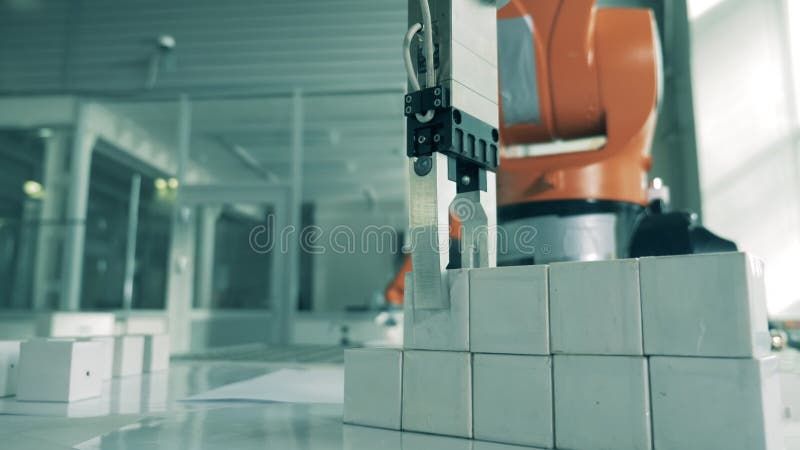High-tech Robot is Displacing Small Cubes Stock Footage - Video of ...