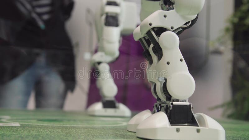 Two Robots Dancing. Smart Robotic Technology. Closeup of Smart Robots ...