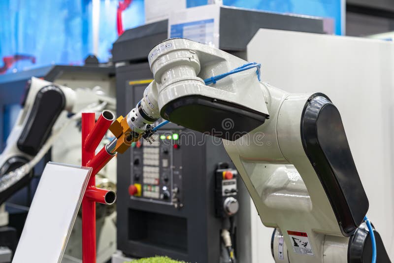 Robot Arm Remove Finish Products on Injection Molding Machine Stock ...