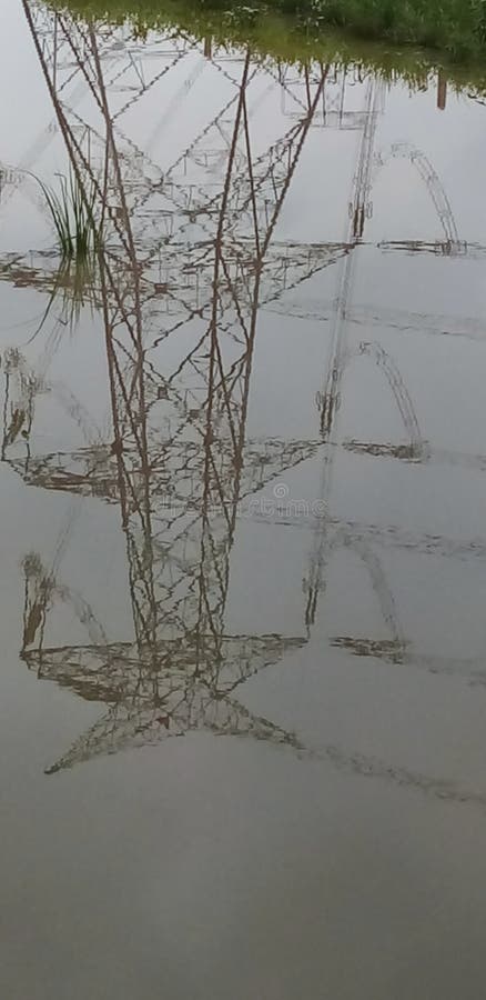 High tension current water stock photo. Image of mast - 219833270