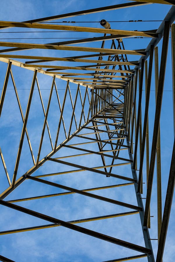 High-tension Transmission Tower Up View. Vertical Photo Stock Photo ...