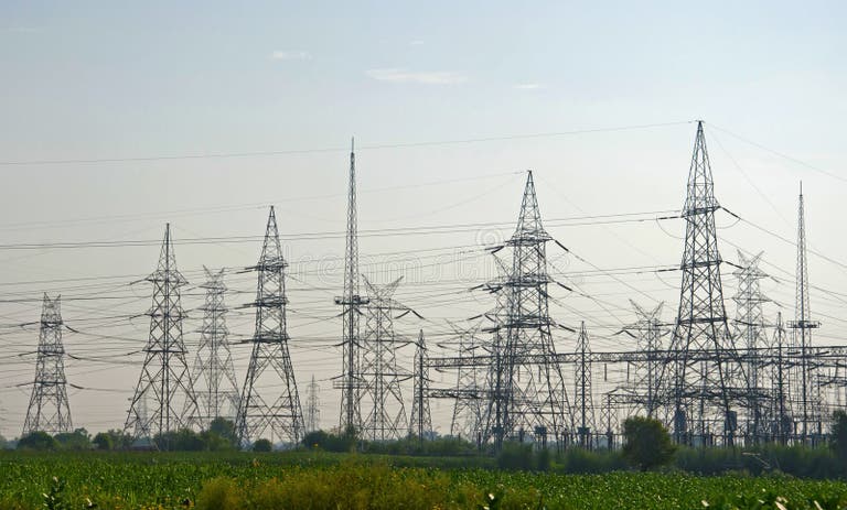 High tension wire polls stock photo. Image of electric - 20861698