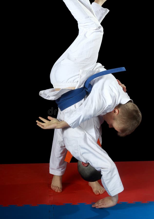 High Throw Uki-goshi in the Performance Athlete with Orange Belt Stock ...