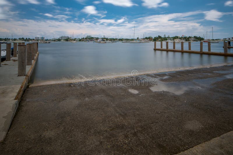 High Tide at the Docks. Long Exposure Shot for Motion Blur in Sky ...