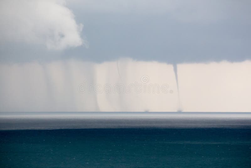 High tornado over the sea stock image. Image of twister - 107821205