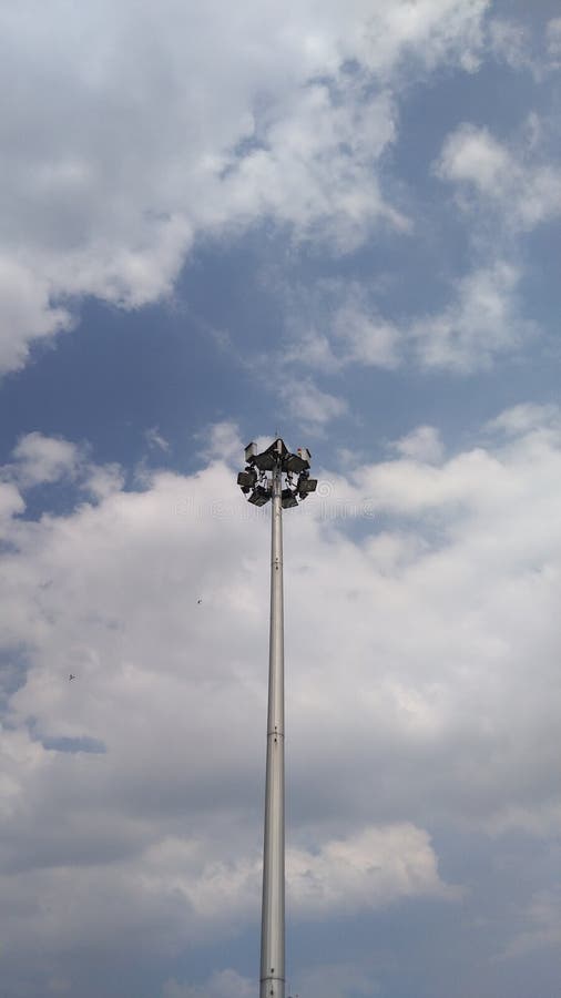 High Tower at the Airport, and Birds Flying in the Beautiful Clouds ...