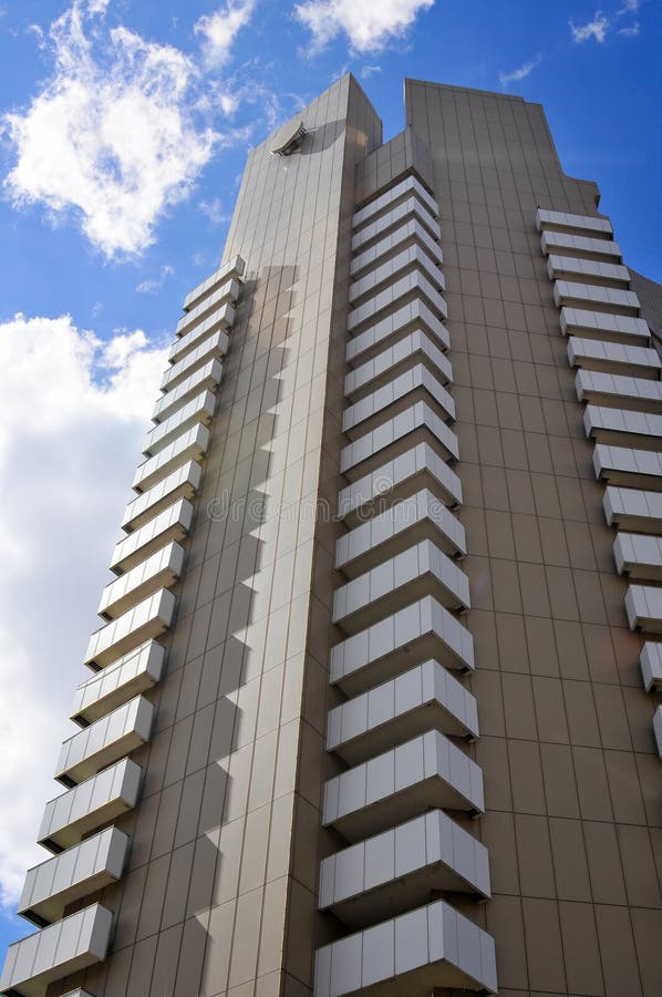 High tower and clouds stock photo. Image of urban, accommodations ...