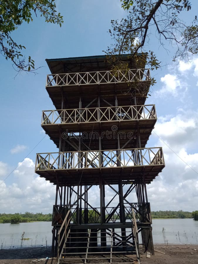 High Tower of Terraced Wooden Material on the Lake Stock Image - Image ...