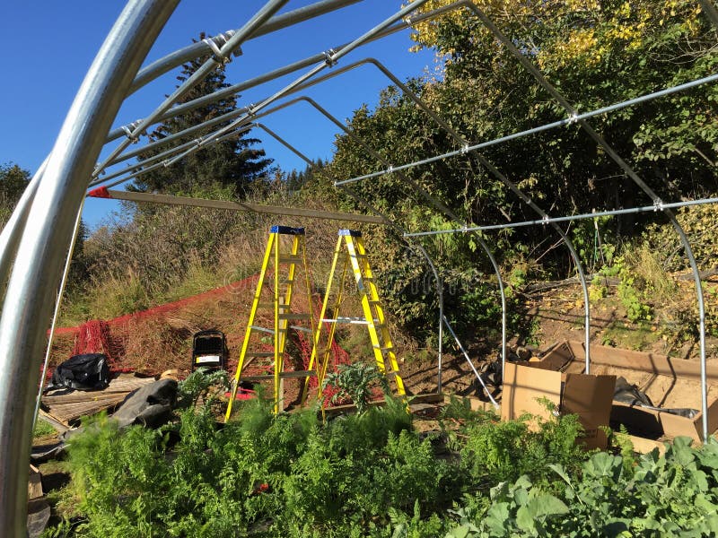 High Tunnel Frame Under Construction Stock Image - Image of blue, tubes ...