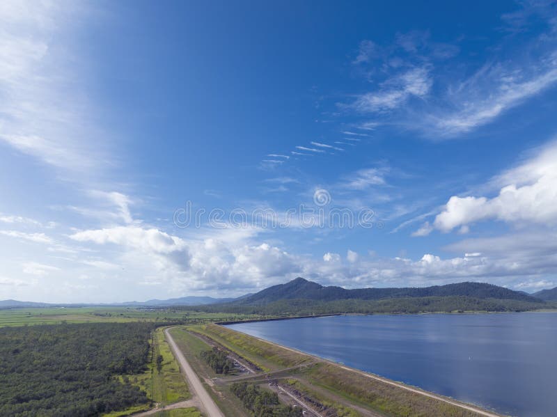 High View of a Dam Wall Under a Cloudy Sky Stock Image - Image of ...