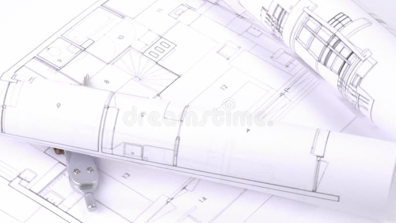 High View of Plans and Blueprints Turning Stock Video - Video of ...