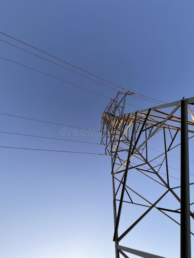 High Voltage Cable Tower during Sunset on a Mountain Stock Image ...