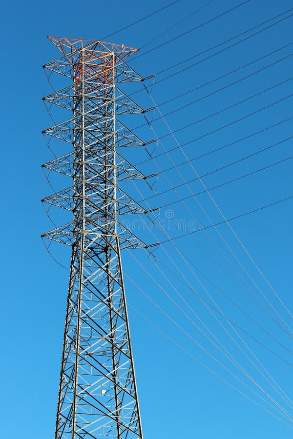 High Voltage Cables on a Tall Electric Pylon Stock Photo - Image of ...