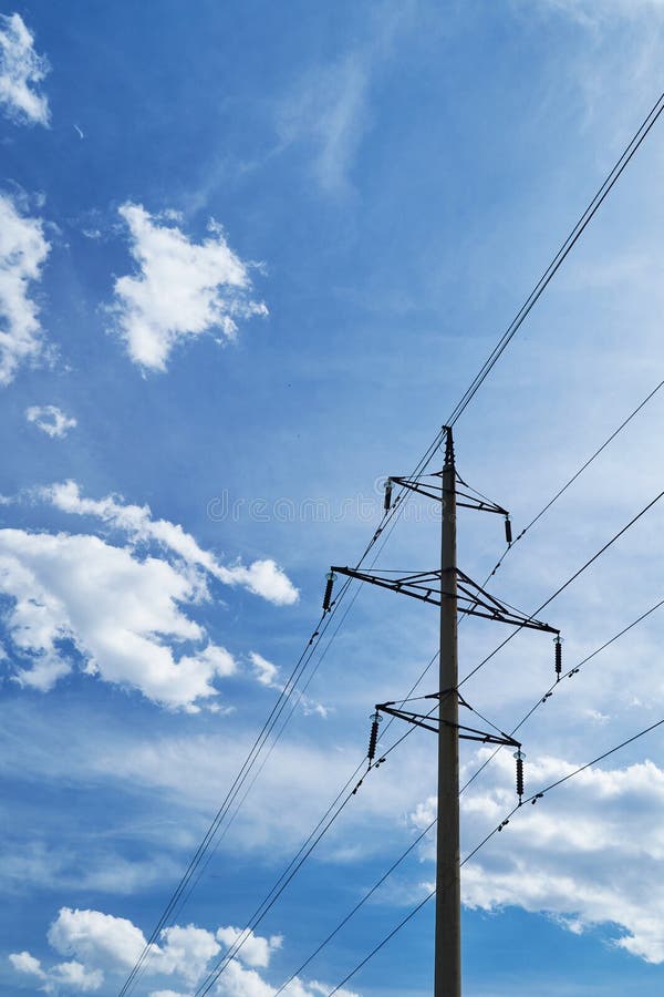 High-voltage Electric Line Against a Bright Beautiful Sky Stock Photo ...