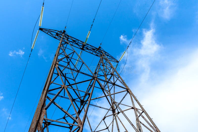 High Voltage Electric Pillar from Under. a High-voltage Electricity ...