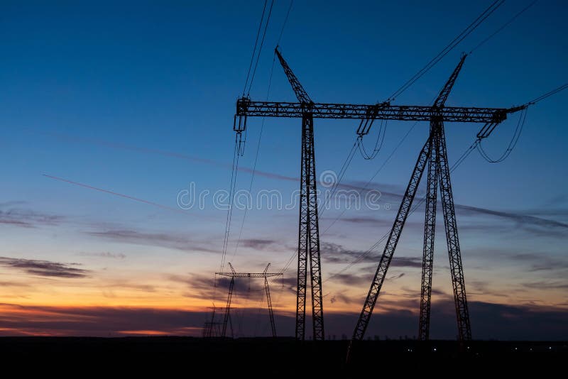 High Voltage Electric Pole and Transmission Lines. Energy Delivery ...