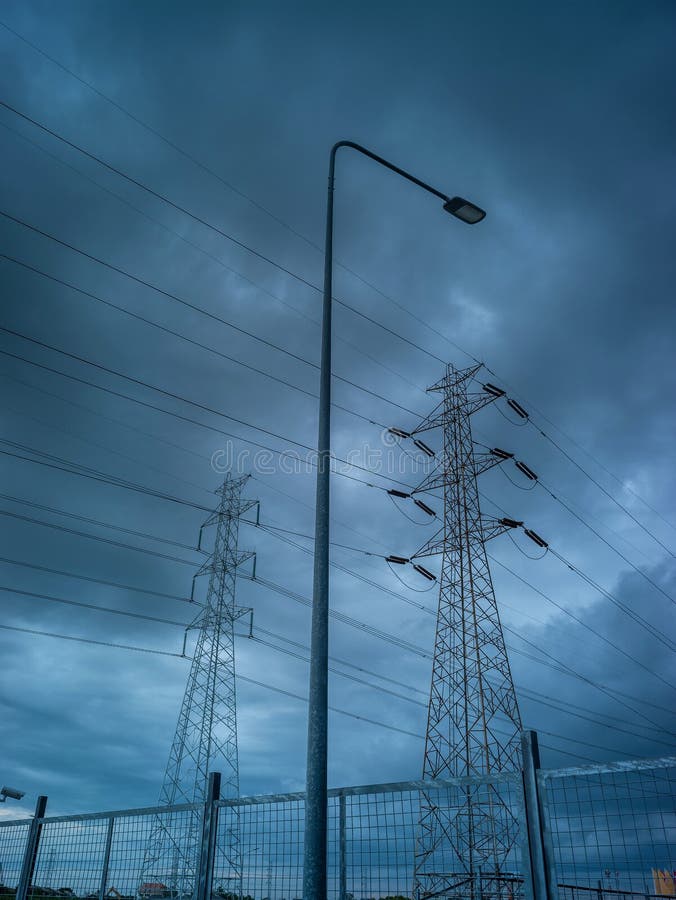 High Voltage Electric Pole in Rain Storm Stock Image - Image of ...