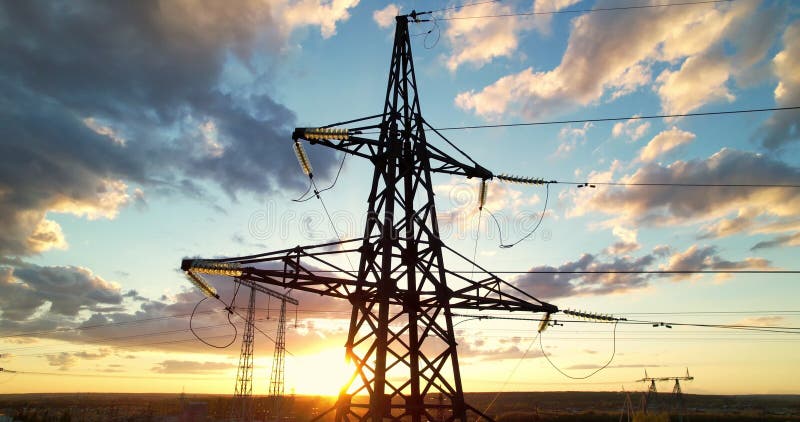 High-voltage Electric Pole Support at Sunset Aerial View Stock Footage ...