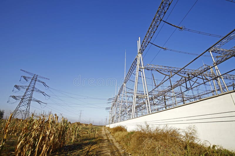High Voltage Electric Tower Line Stock Photo - Image of building ...