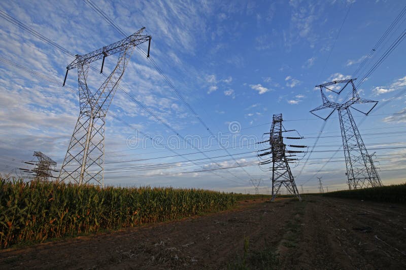 High Voltage Electric Tower Line Stock Photo - Image of building ...