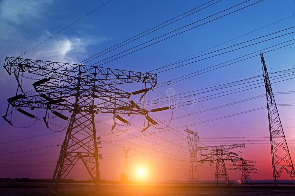 High Voltage Electric Tower Line Stock Photo - Image of blue, plants ...