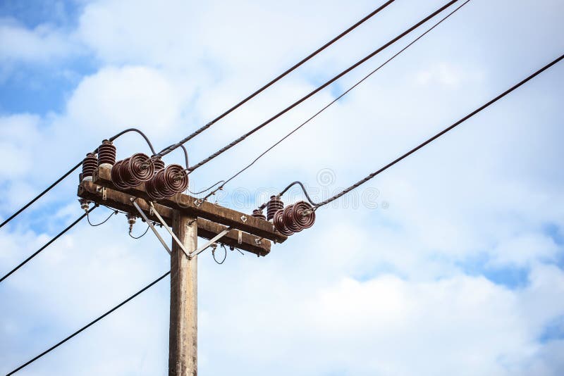 High Voltage Electric Wire with a Blue Sky Background Stock Photo ...
