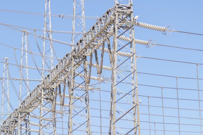 High Voltage Electrical Grid Distributing Power on a Sunny Day Stock ...