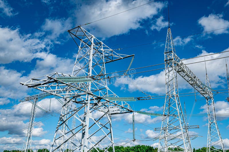 High Voltage Electrical Network Against the Blue Sky Stock Image ...
