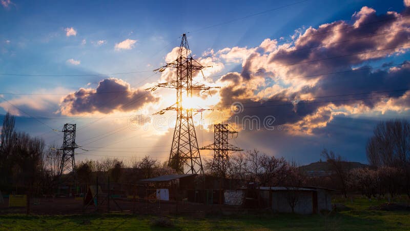 High Voltage Electrical Pole Structure on Background Dramatic Sunset ...