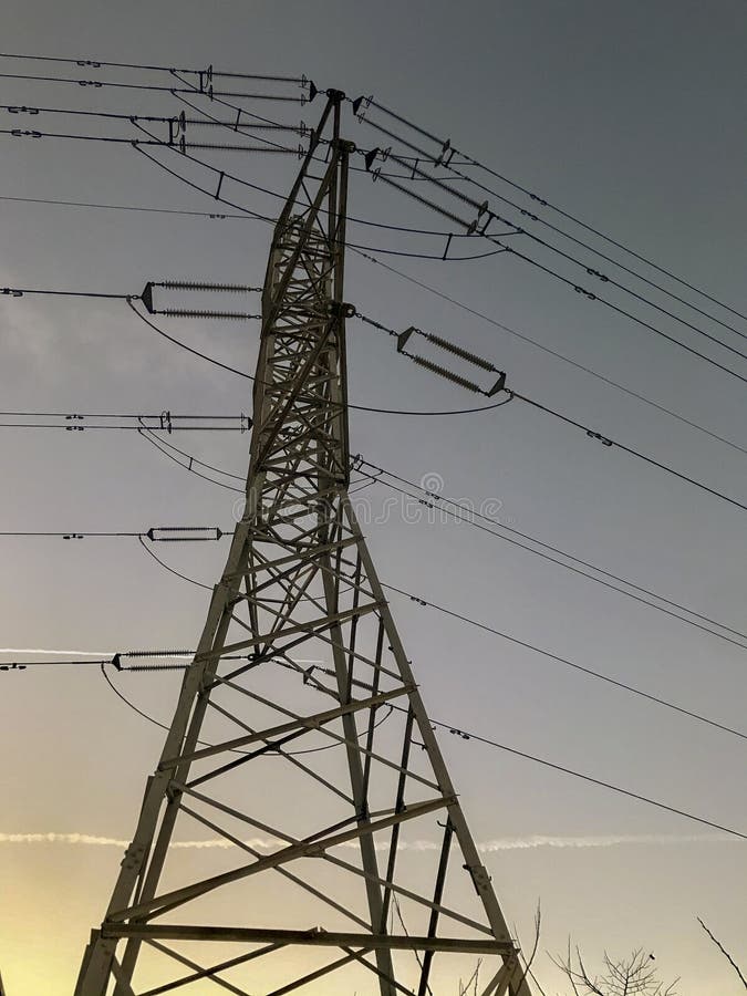 High Voltage Electrical Tower with Blue Sky Background Stock Image ...