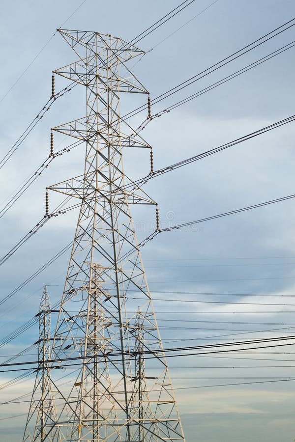High Voltage Electricity Pillars Stock Photo - Image of silhouette ...