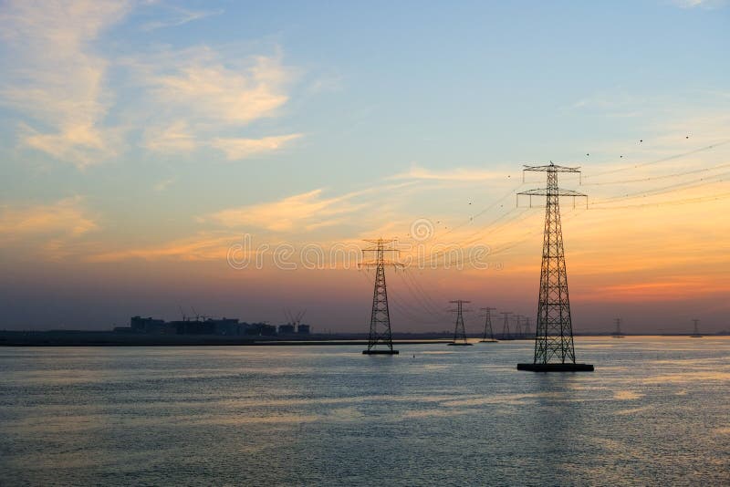 High Voltage Electricty Power Lines Distributed through Ocean Wi ...