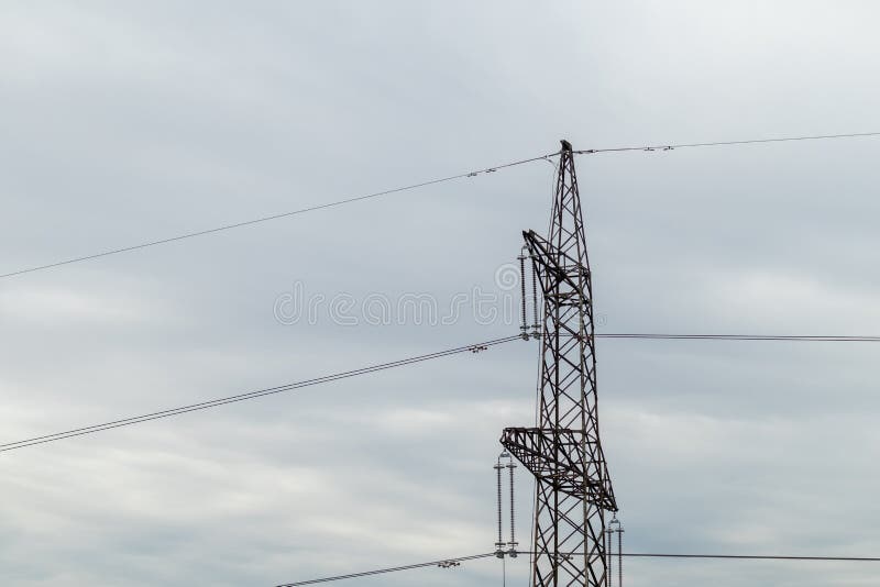 High Voltage Power Line Pole Close-up. Power Line Mast on a Blue Sky ...