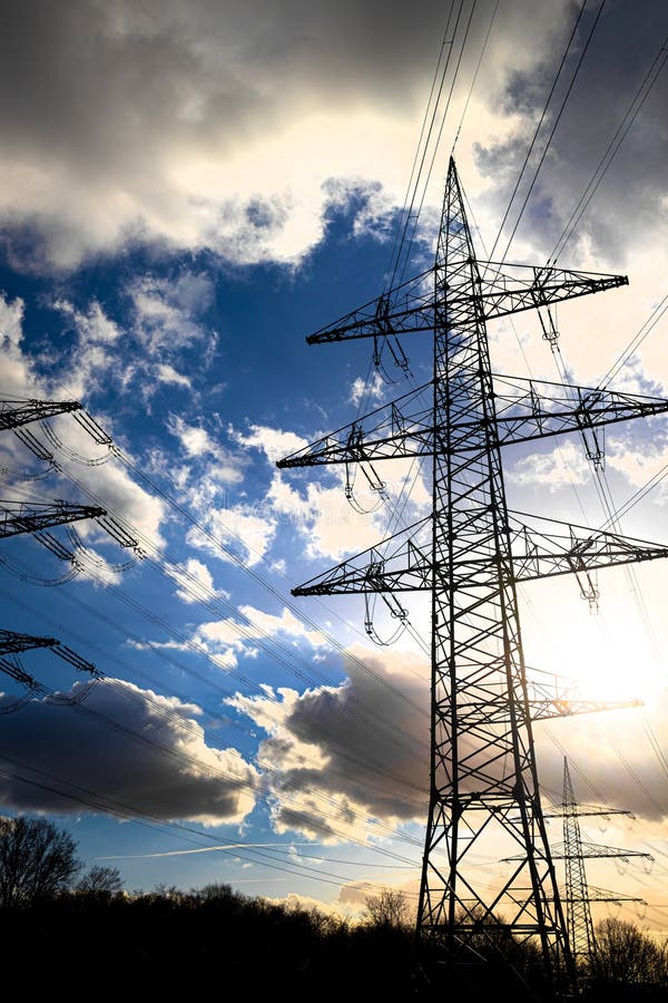 High Voltage Line in the Evening Sun Perpendicular Stock Photo - Image ...
