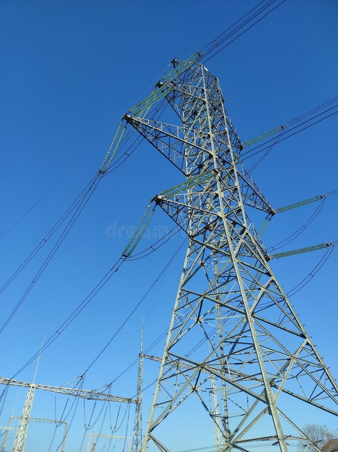 High Voltage Lines and Metallic Pole of Power Grid Stock Image - Image ...