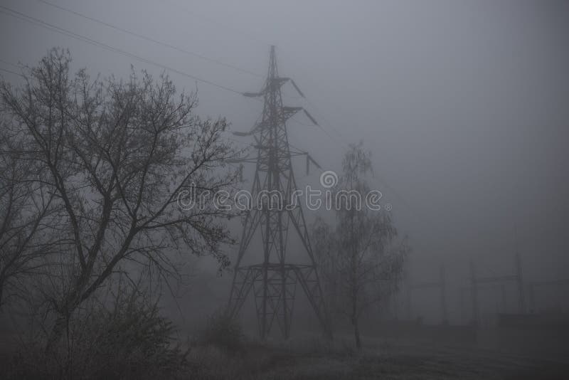 High-voltage Pole in the Mist Stock Image - Image of foggy, environment ...
