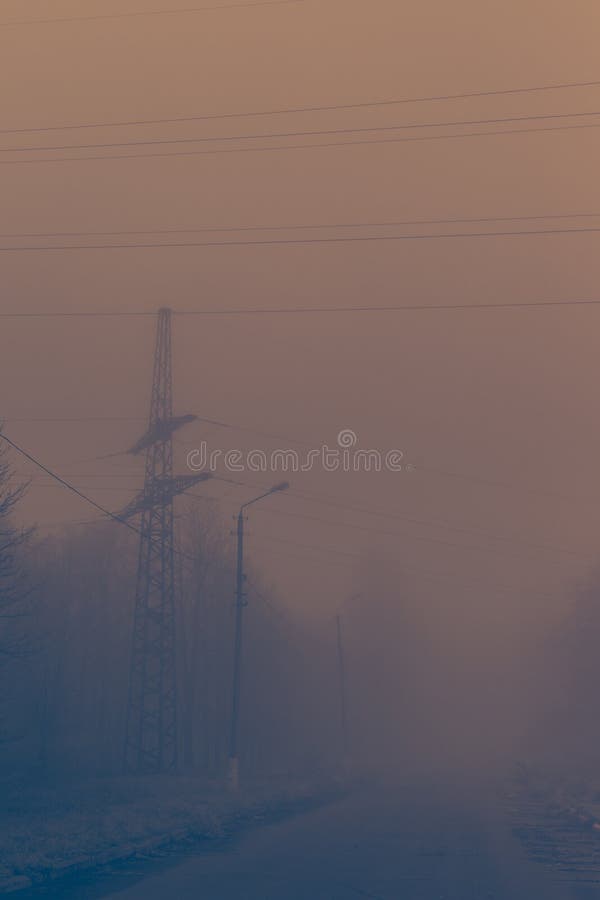 High-voltage Pole in the Mist Stock Image - Image of frame ...